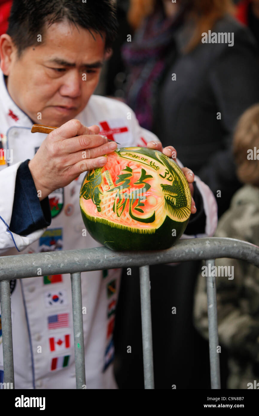 Carving intricate design into a melon Stock Photo - Alamy