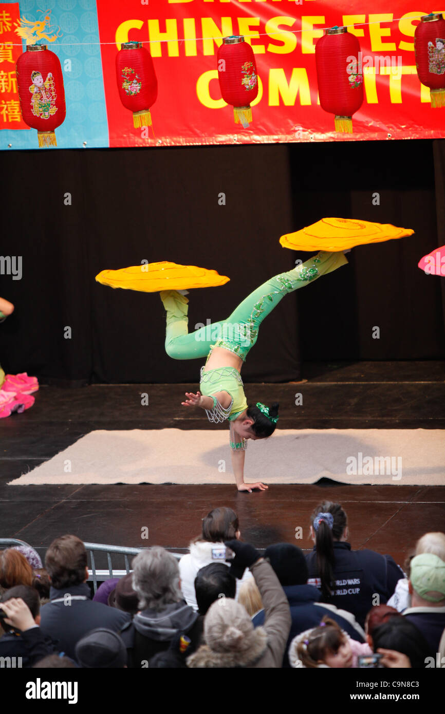Young girl doing acrobatic dance during Chinese New Year show in ...