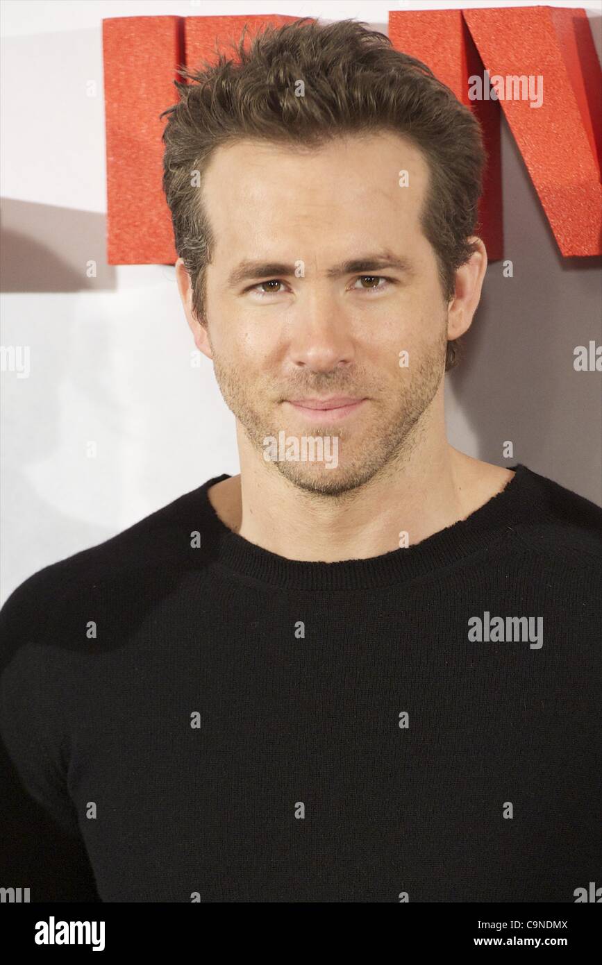 Jan. 31, 2012 - Madrid, Spain - RYAN REYNOLDS smiles as he attends the ...