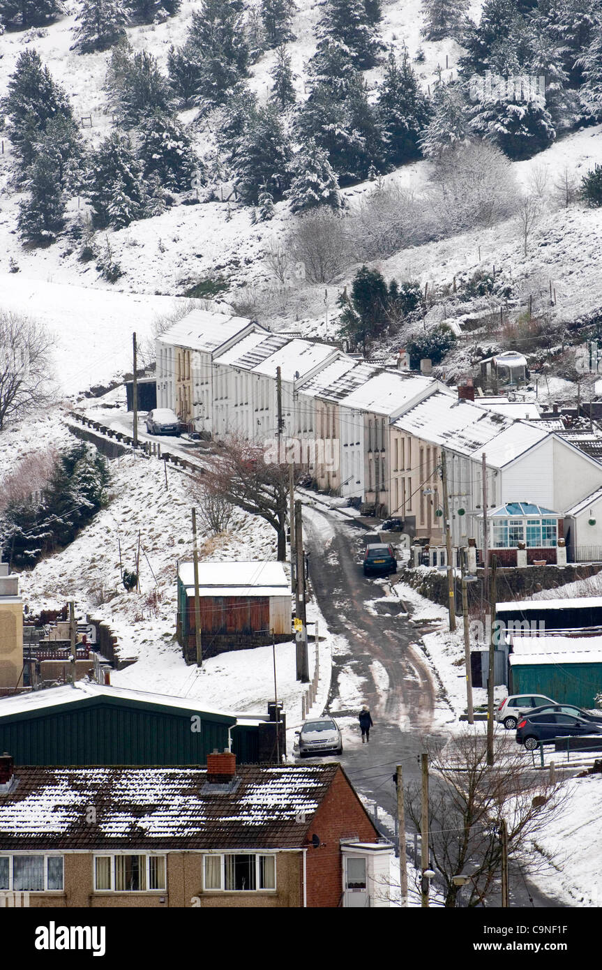 People venturing out into the picturesque snow scenes in the small ...