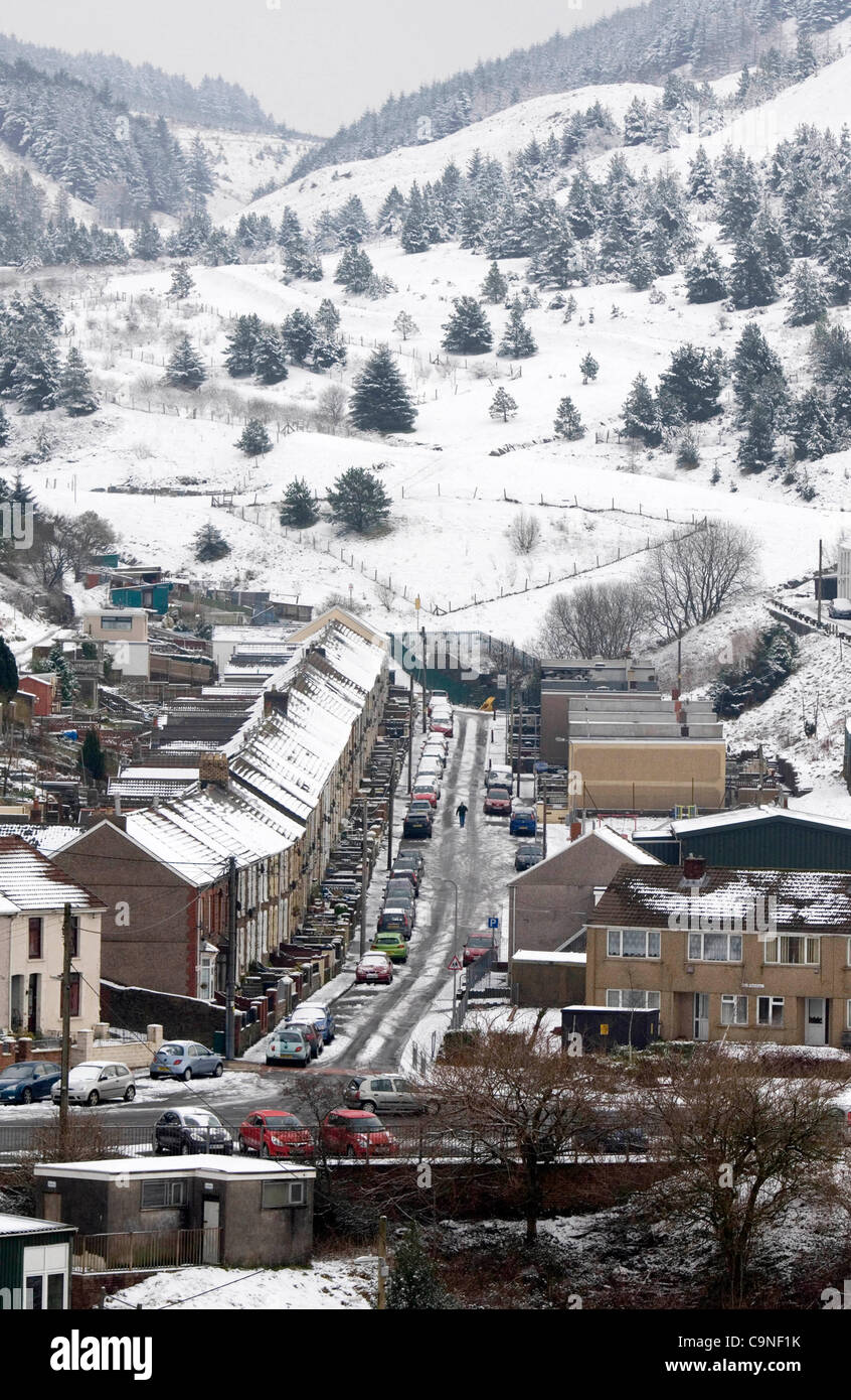 People venturing out into the picturesque snow scenes in the small ...