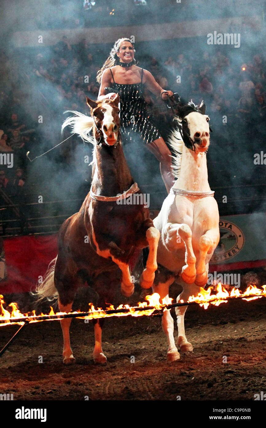Feb. 03, 2012 - St. Paul, Minnesota, U.S. - A trick rider rides two ...