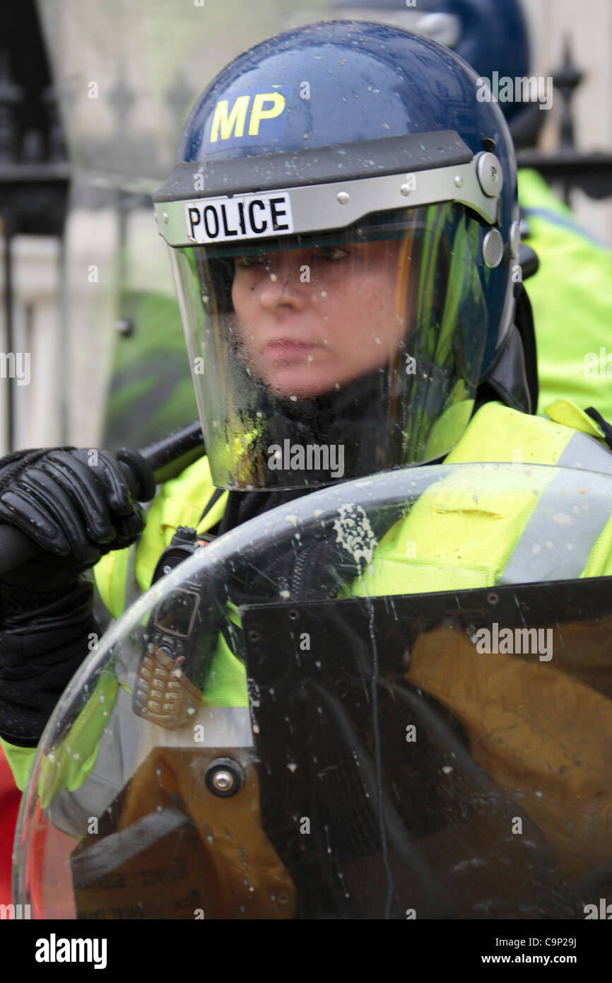 Female Police officer as violence flares at Syrian Embassy protest in ...