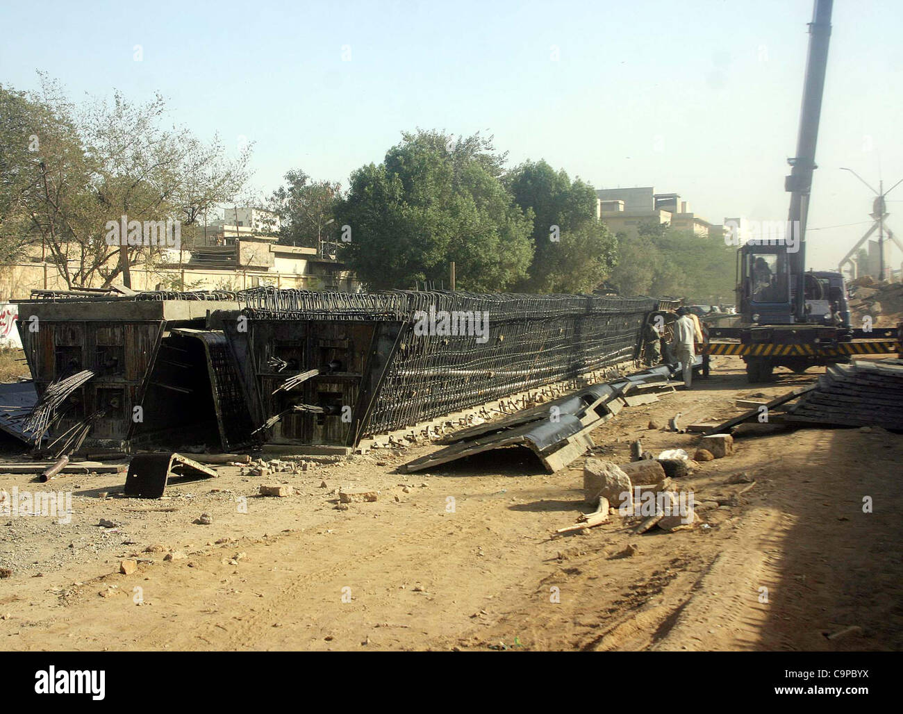 Labors busy in construction work of bridge at SITE area in Karachi on ...