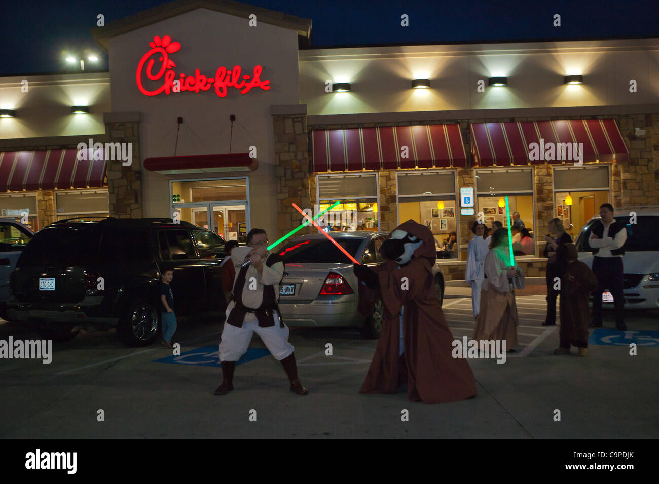 Feb. 7, 2012 - Houston, Texas, U.S - Chick-Fil-A mascot cow and Obi Wan ...
