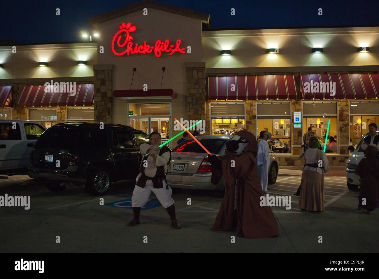 Feb. 7, 2012 - Houston, Texas, U.S - Chick-Fil-A mascot cow and Obi Wan ...