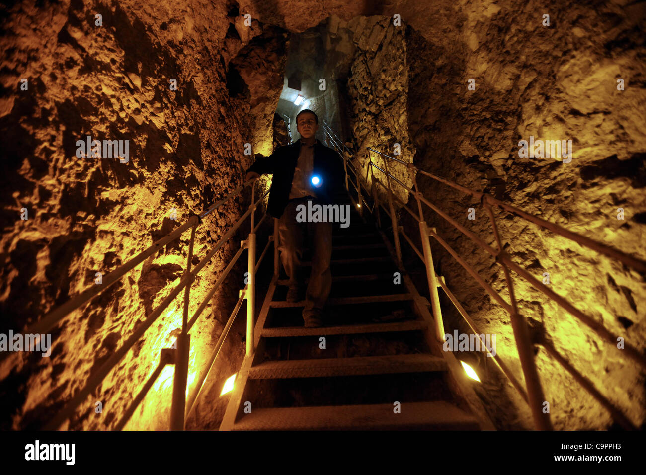 A visitor walks through the ancient water channel called the “Warren’s ...