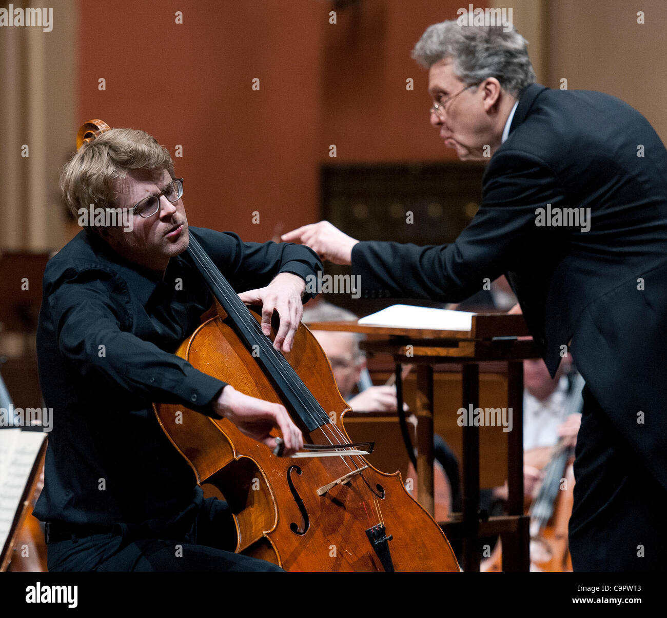 Russian conductor Vassily Sinaisky, right, and German cellist Julian ...