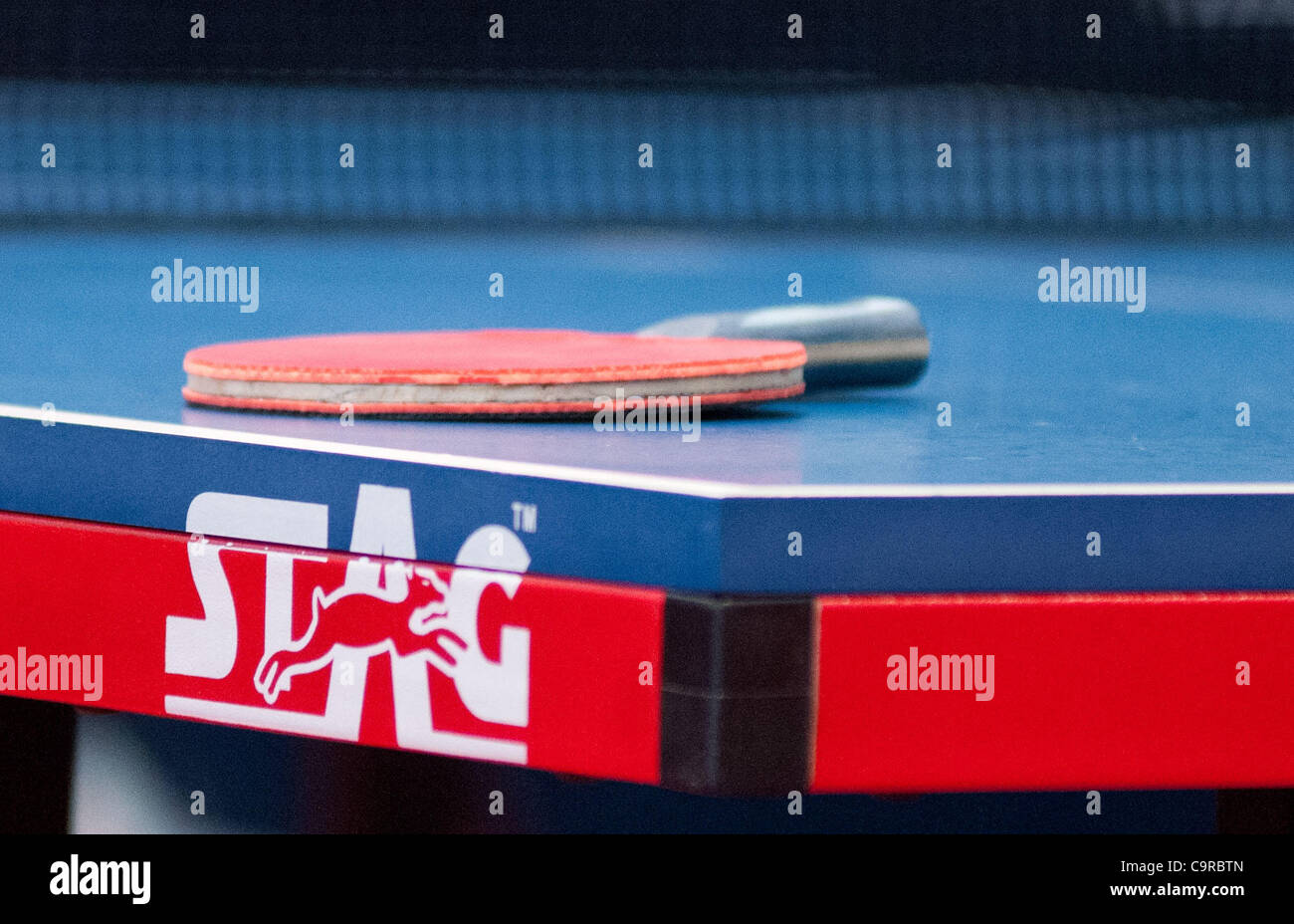 A table tennis paddle lays on a competition table at the U.S. Olympic ...