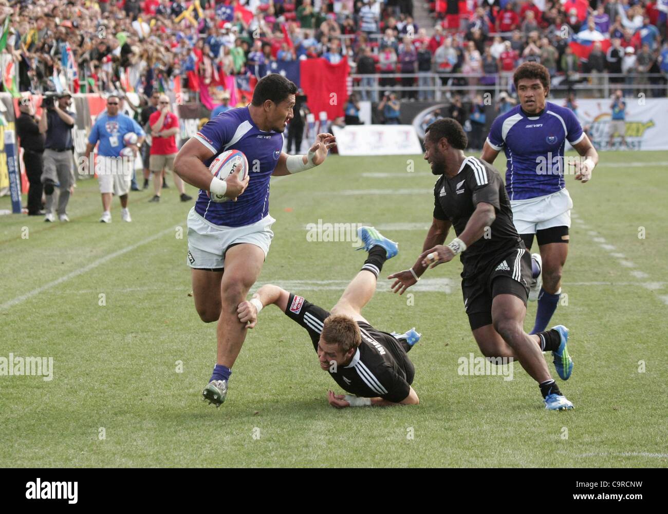 Alafoti Faosiliva, Tim Mikkelson, Tomasi Cama at a public appearance ...