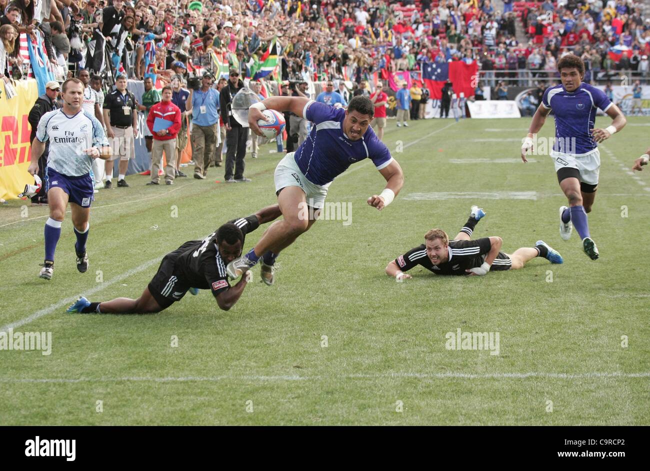 Alafoti Faosiliva, Tomasi Cama at a public appearance for 2012 USA ...