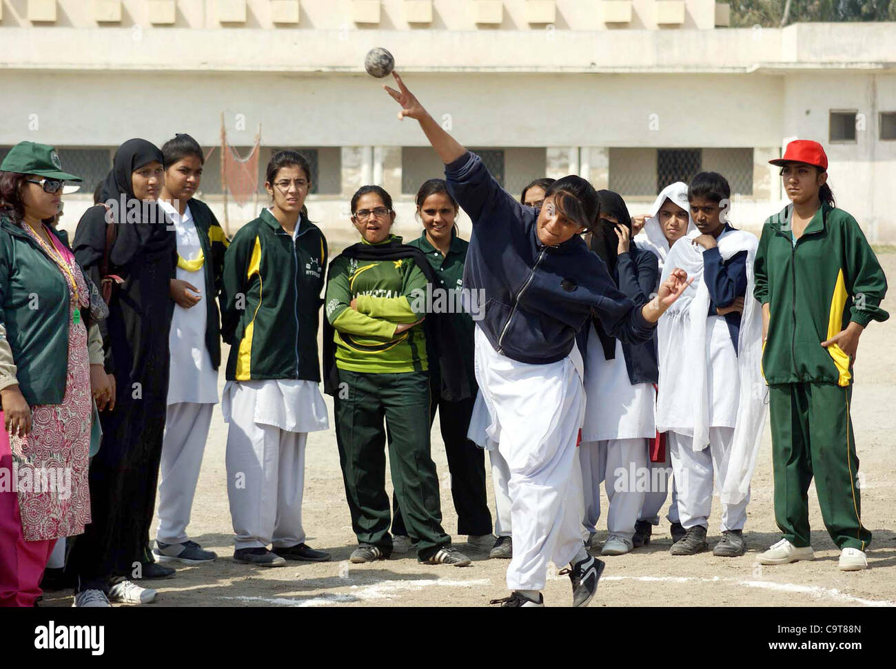 Board stadium hyderabad a student throws ball hi-res stock photography ...