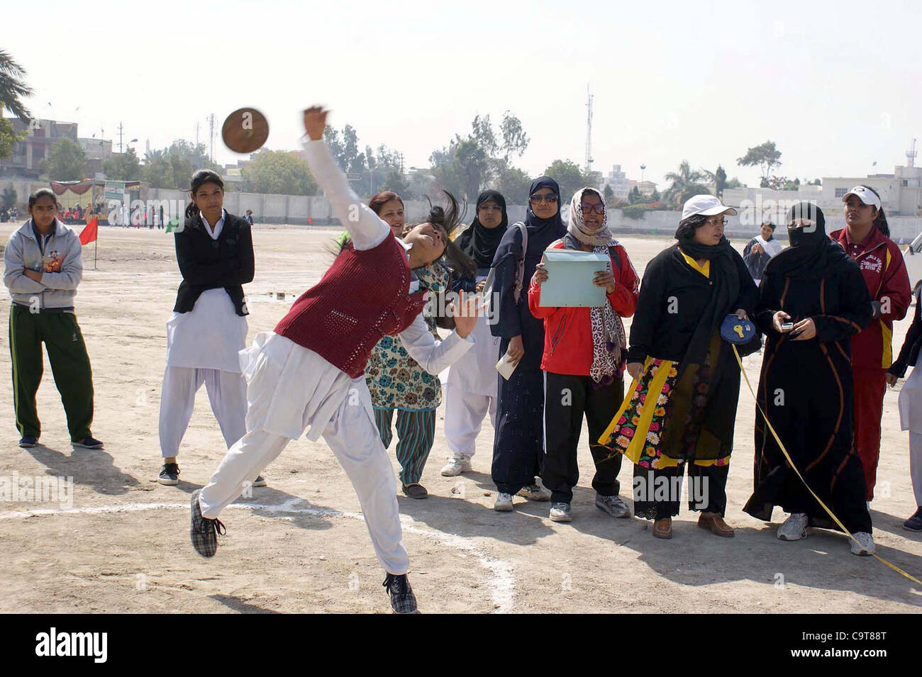 A student throws discus during discus throw event on the occasion of ...