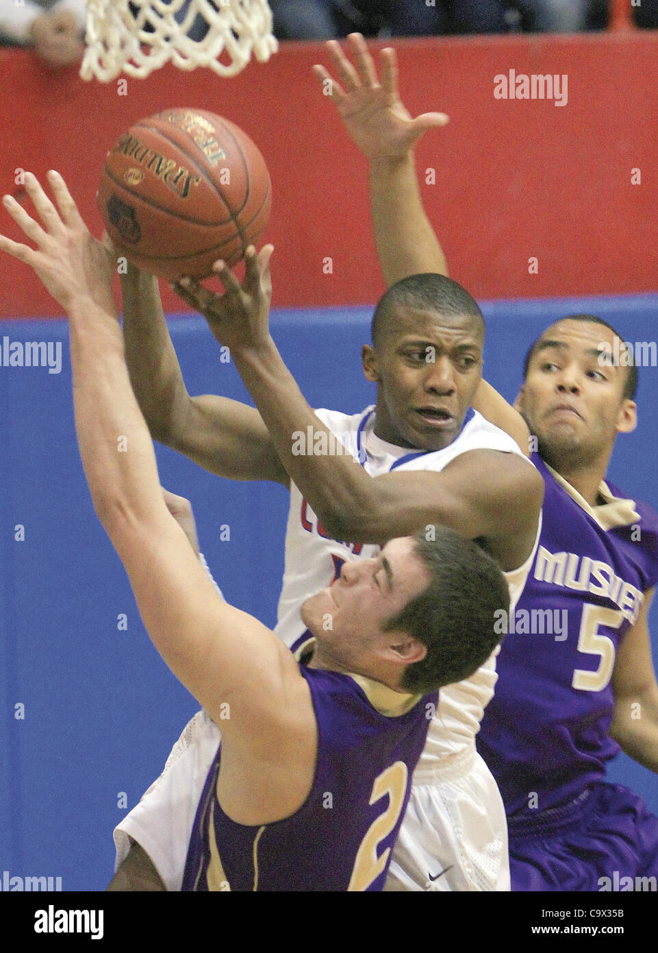Feb. 20, 2012 - Davenport, Iowa, U.S. - Davenport Central's Demetrius Butler looks to pass as ...