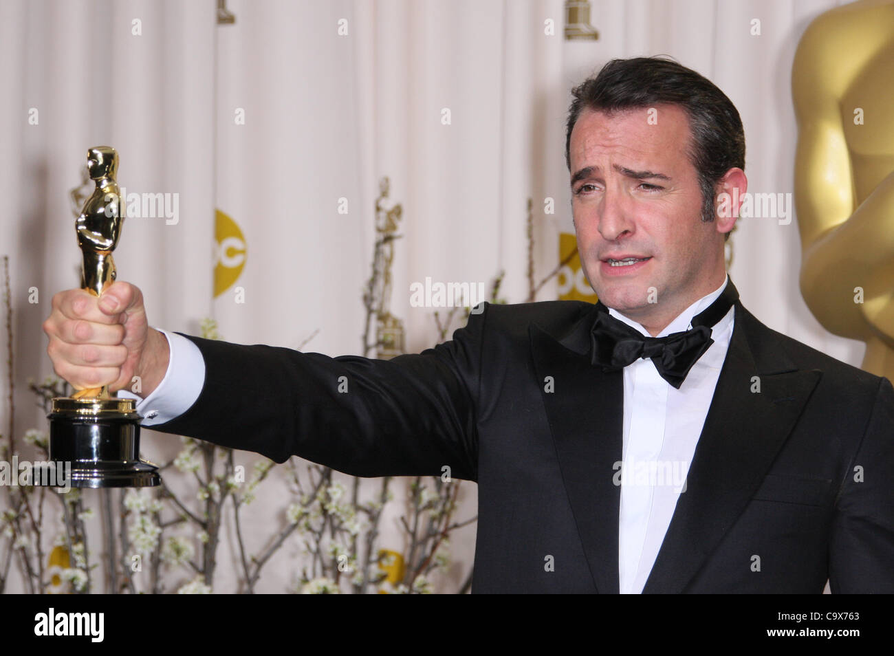 JEAN DUJARDIN THE 84TH ACADEMY AWARDS PRESSROOM LOS ANGELES CALIFORNIA ...