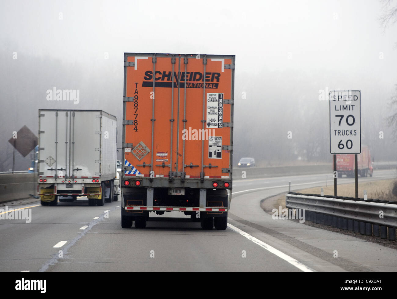 Feb. 29, 2012 - Whitmore Lake, Michigan, U.S - Two semi trucks drive on ...