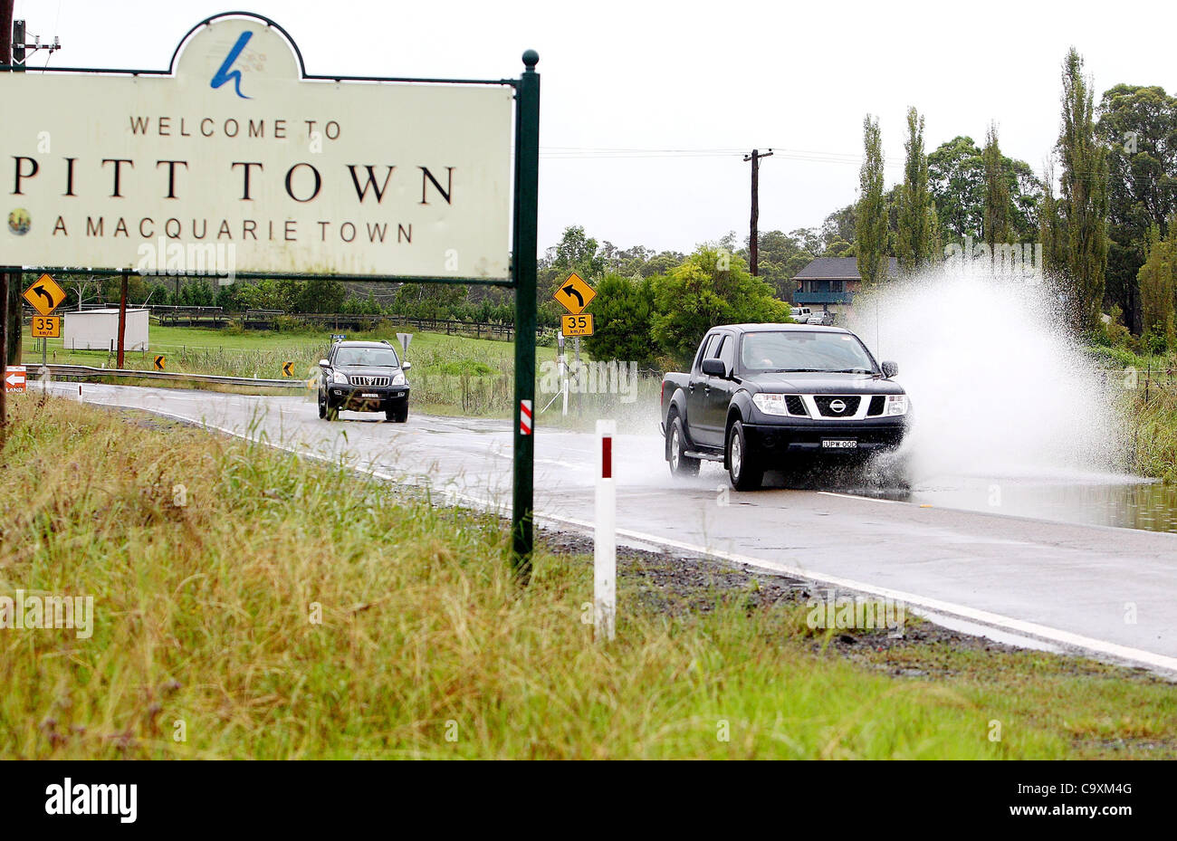 Pitt Town, NSW, Australia, 02, Mar, 2012. A truck drives through flood ...