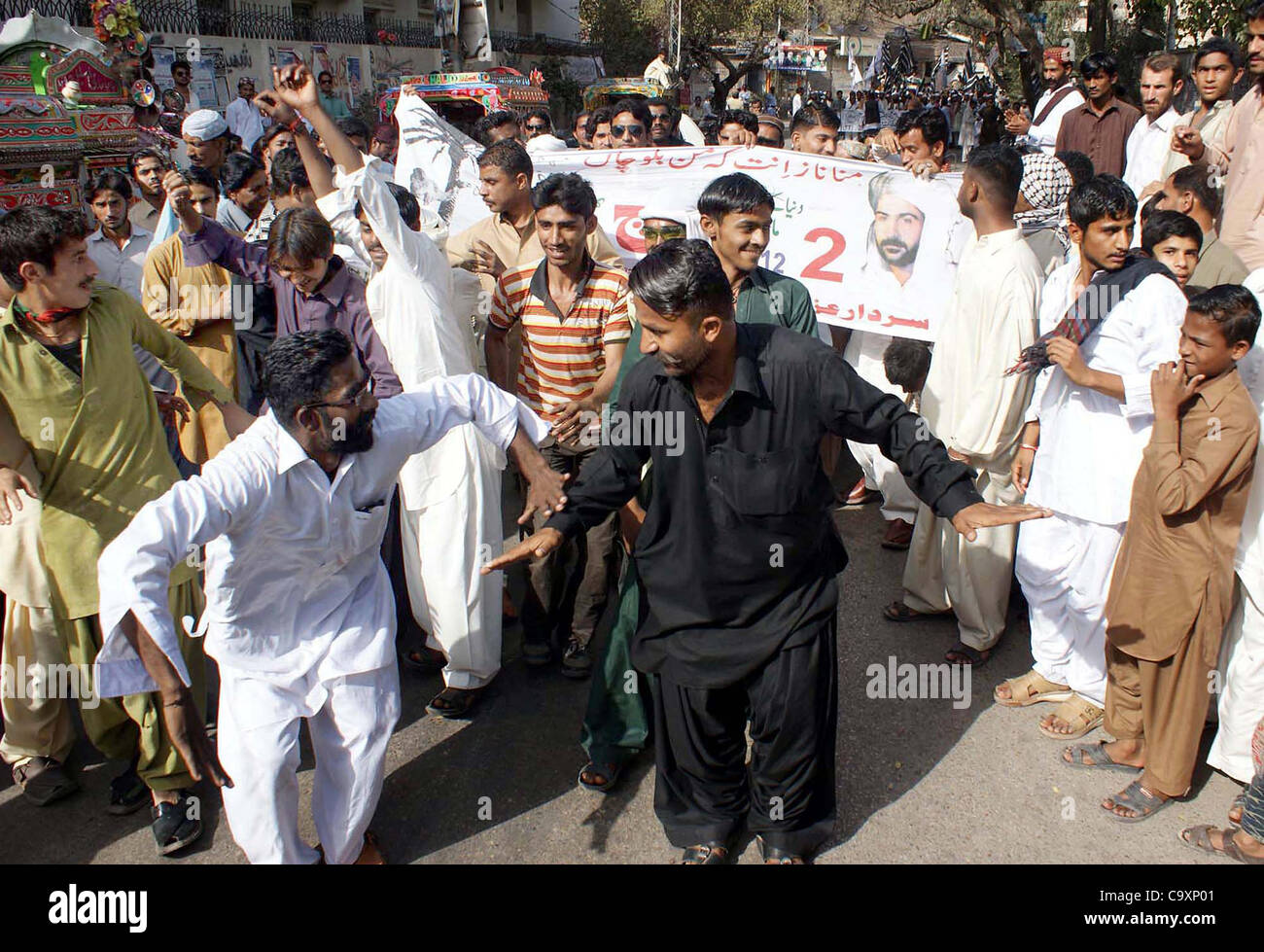 Members of Baloch community dance on traditional tunes during rally to ...