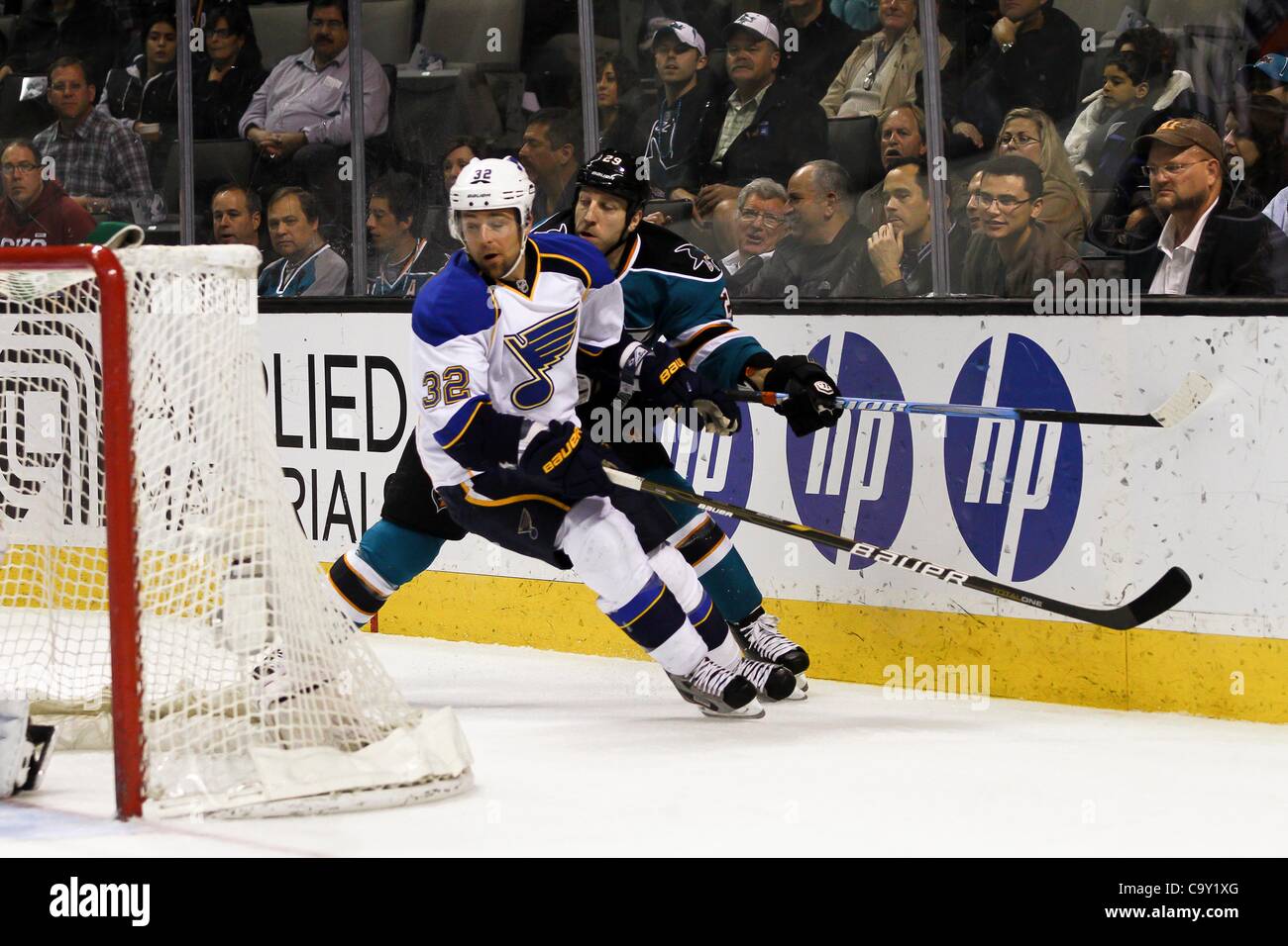 `St. Louis Blues left wing Chris Porter (32) and San Jose Sharks left ...