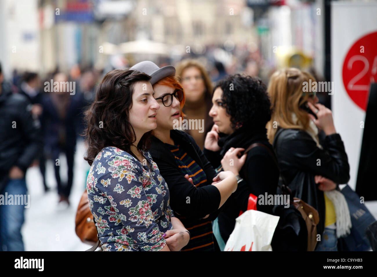 March 8, 2012 - Athens, Greece - Women walk at Ermou street one of the ...