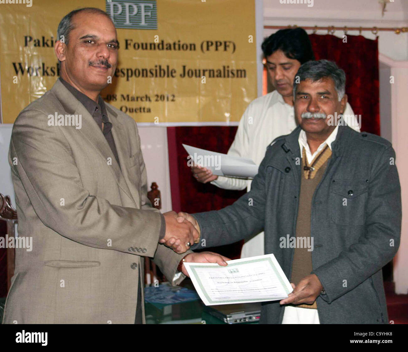 Kamran asad distributes certificates hi-res stock photography and ... Kamran asad distributes certificates hi-res stock photography and ...
