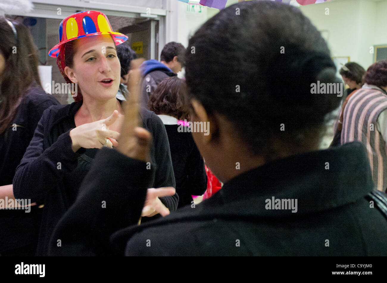 Municipal social worker Merav uses sign language to communicate with ...