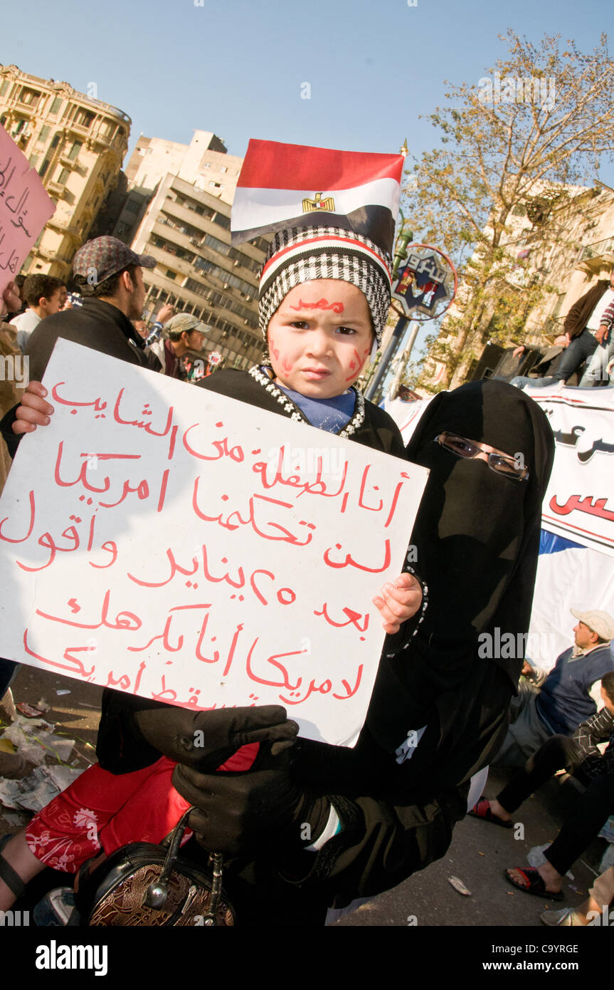 Egyptian citizens continue to flock to Tahrir square with various ...