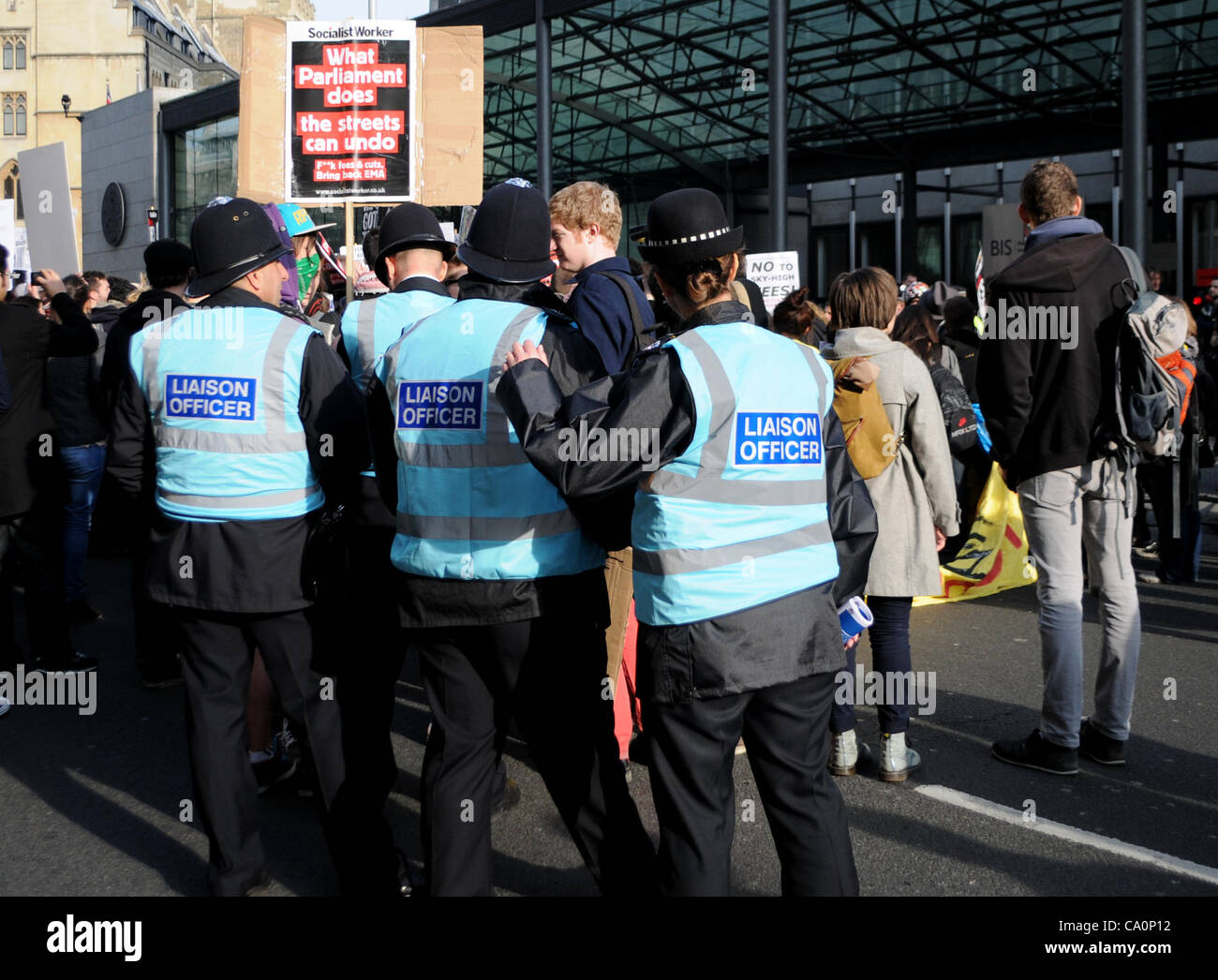 London, UK. 14/03/12. The Met Police's new Protest Liaison Team talking ...
