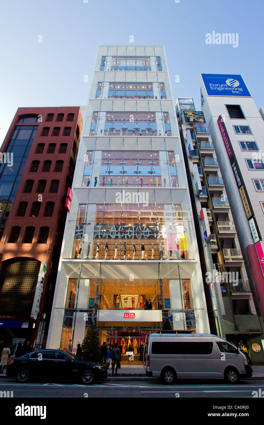 March 15, 2012, Tokyo, Japan - Pedestrians walk past the new Uniqlo ...