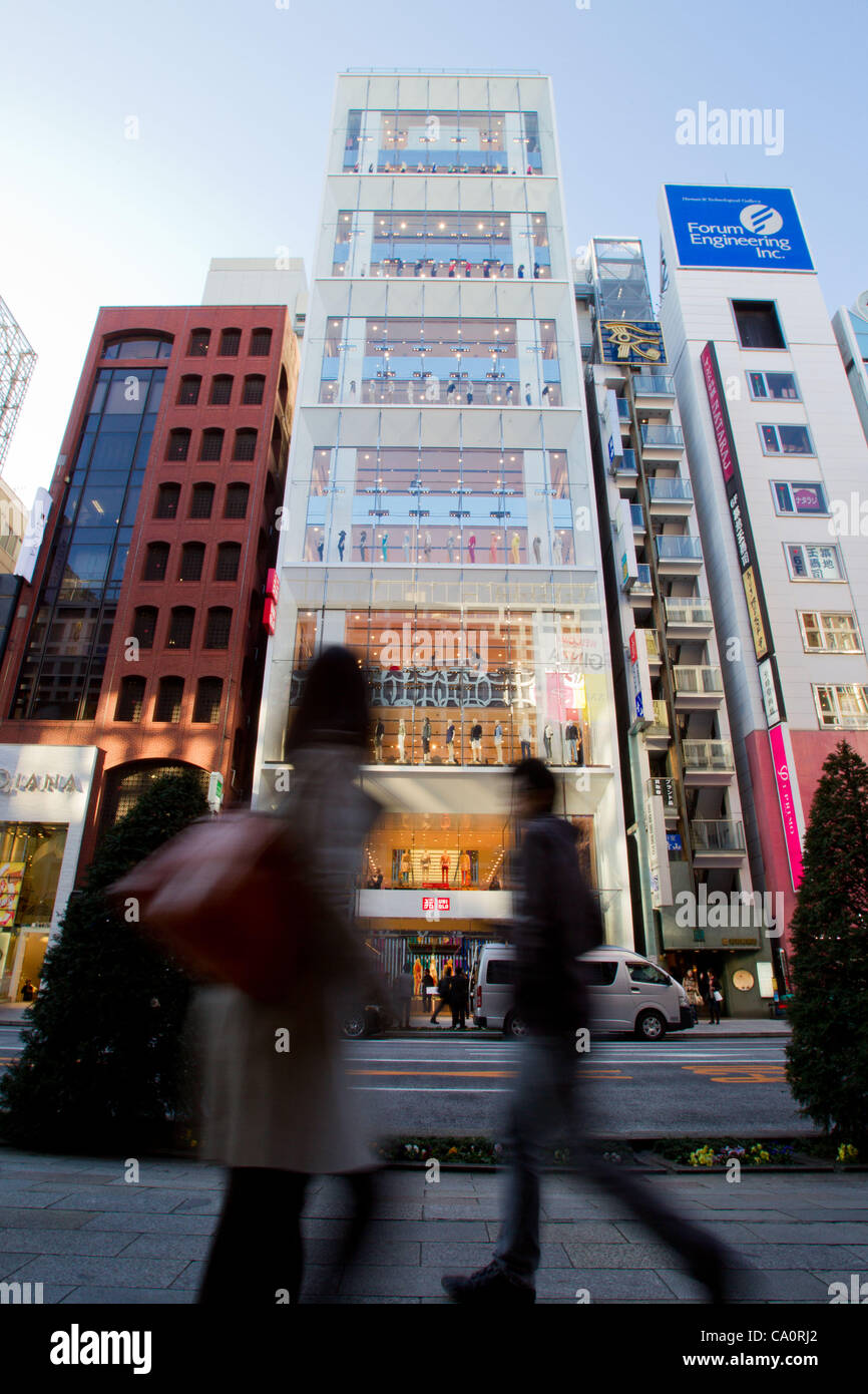March 15, 2012, Tokyo, Japan - Pedestrians walk past the new Uniqlo ...