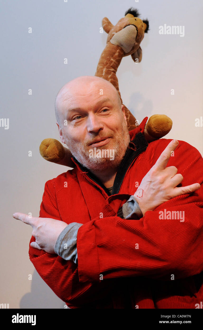 British actor and dramatist Mark Ravenhill (right) speaks during press ...