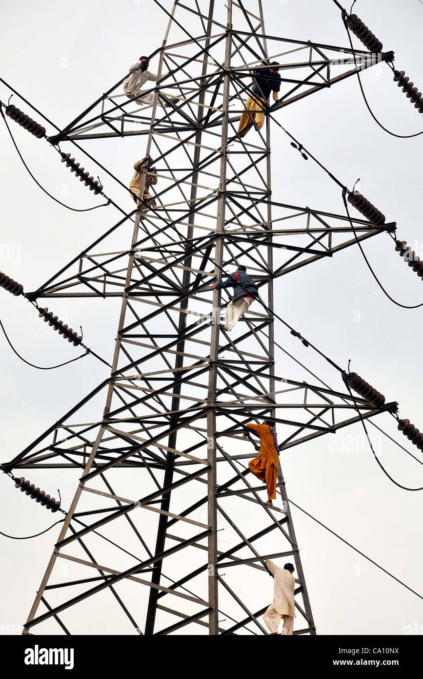 Angry protesters climb the high-tension-electricity-pylon during ...