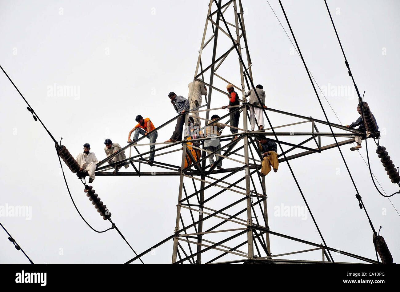 Angry protesters climb the high-tension-electricity-pylon during ...