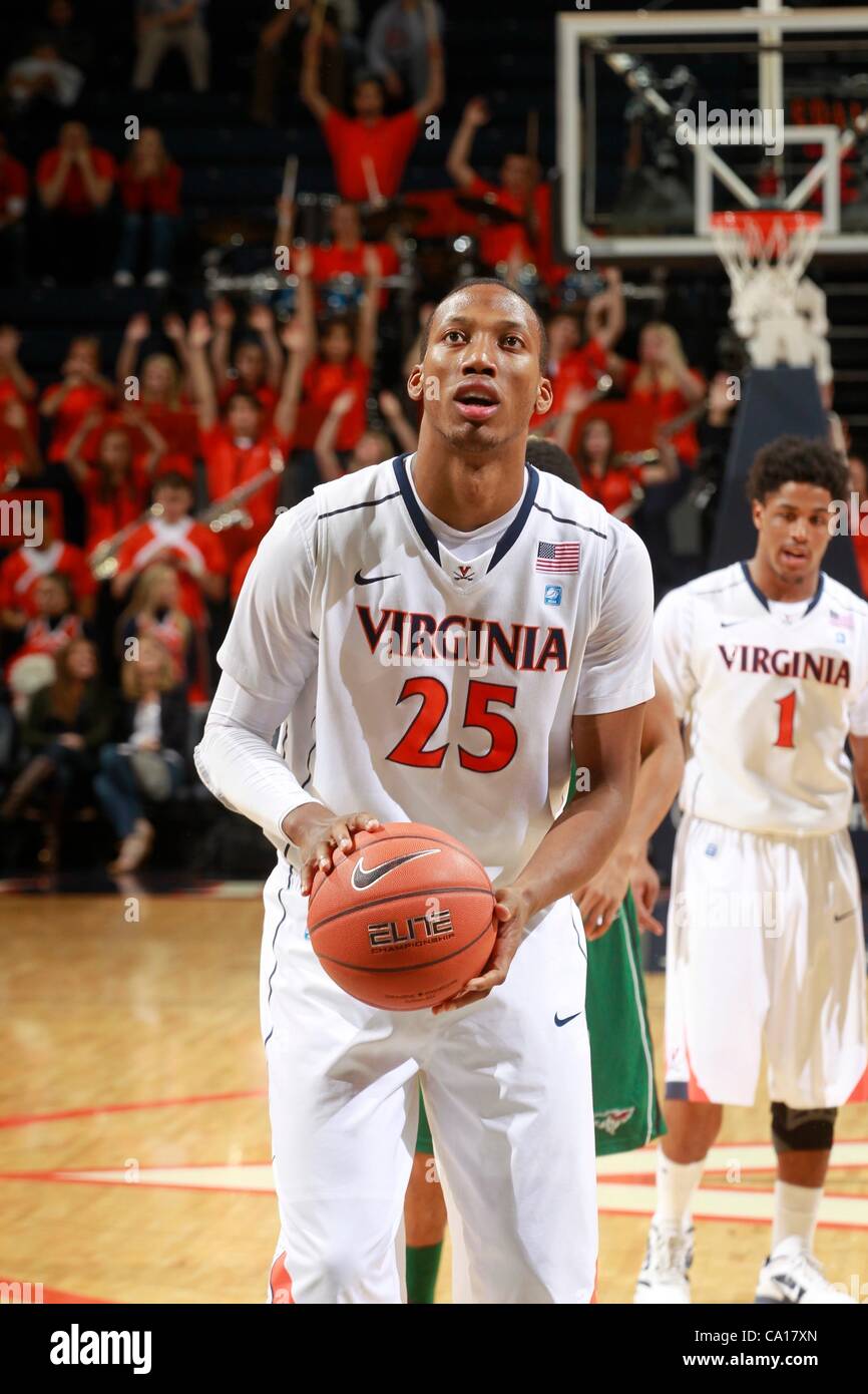 AKIL MITCHELL #25 of the Virginia Cavaliers handles the ball during the ...