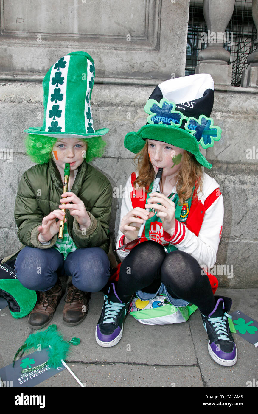 London, UK. 18 Mar, 2012. Children playing flute whistles at the St ...
