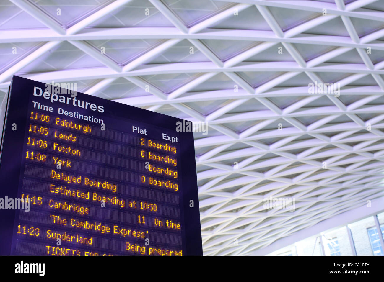 Train departure board at King's Cross Station London Stock Photo - Alamy