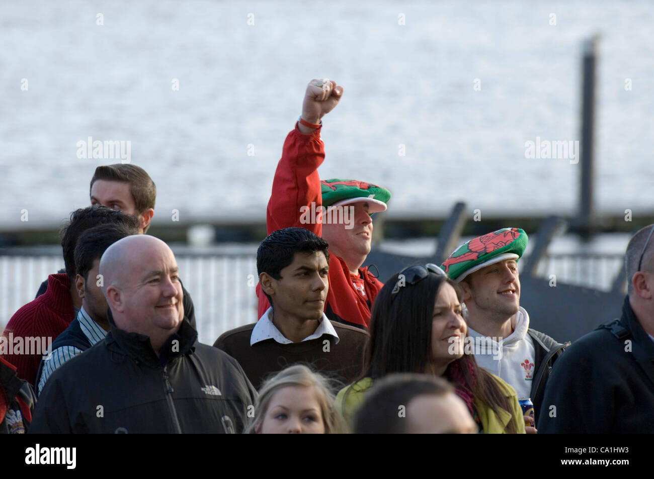 Welsh rugby fans watching the Welsh rugby team celebrate winning the ...
