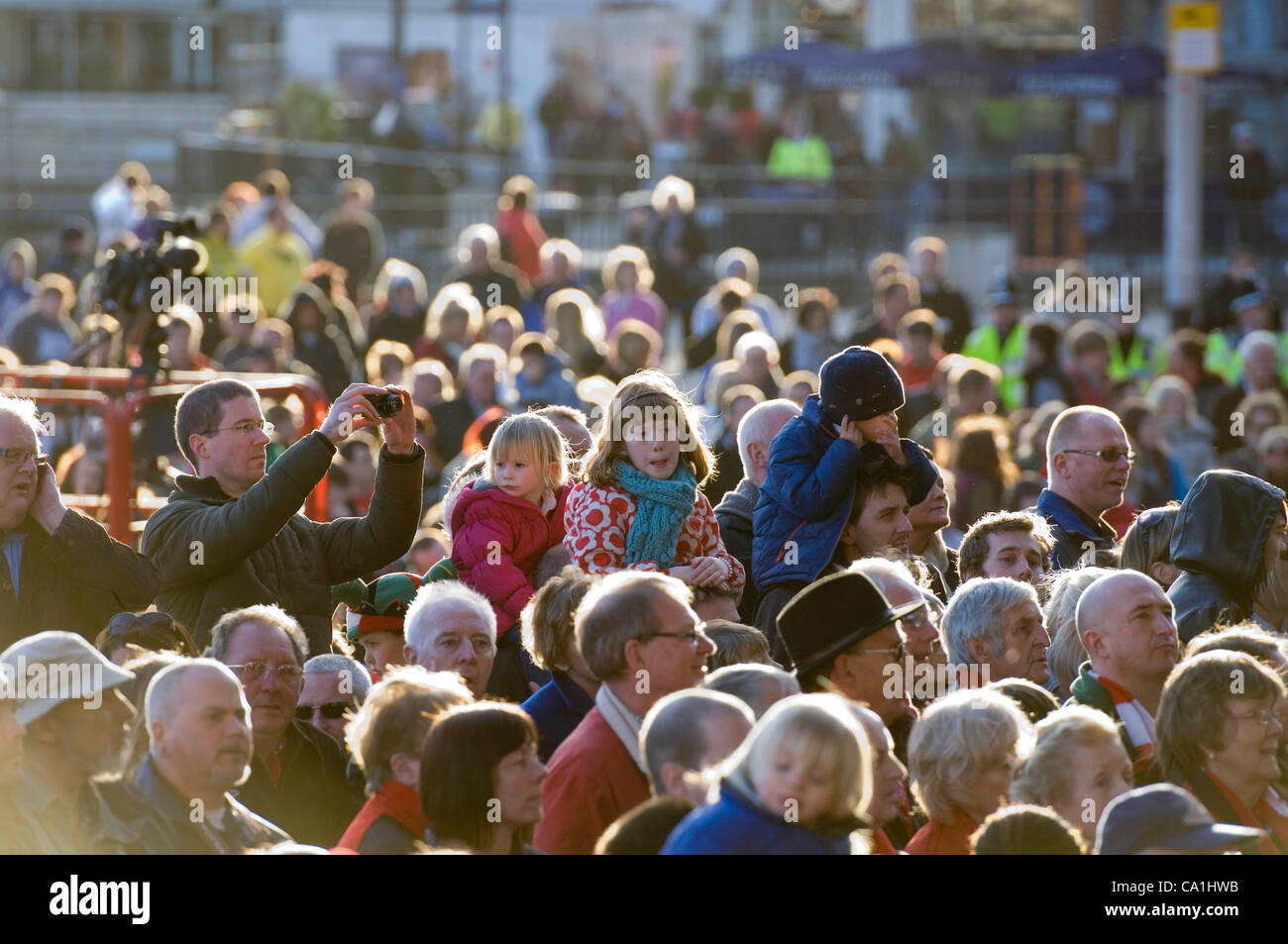 Welsh rugby fans watching the Welsh rugby team celebrate winning the ...