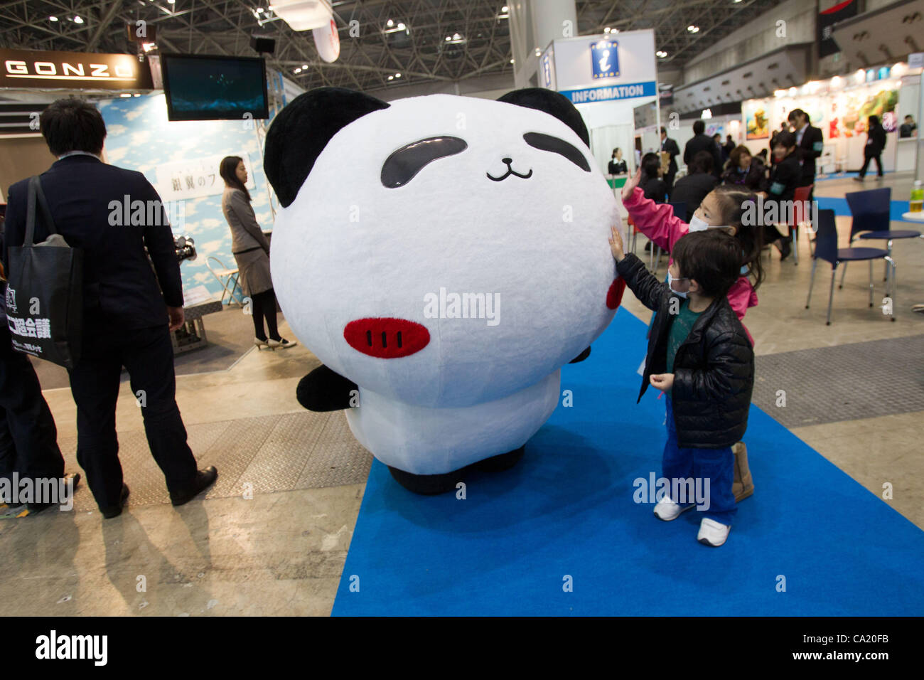March 22, 2012, Tokyo, Japan - Two children touch Rico's "Panda no Tapu ...