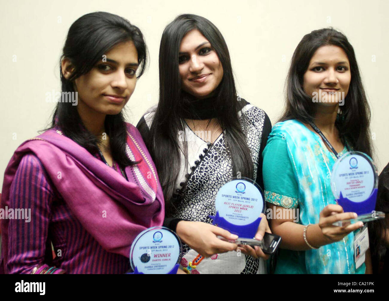 University students hold shields during hi-res stock photography and ...