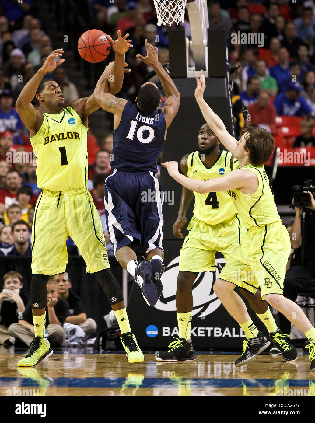 March 23, 2012 - Atlanta, Georgia, USA - Xaviers Mark Lyons turned the ...