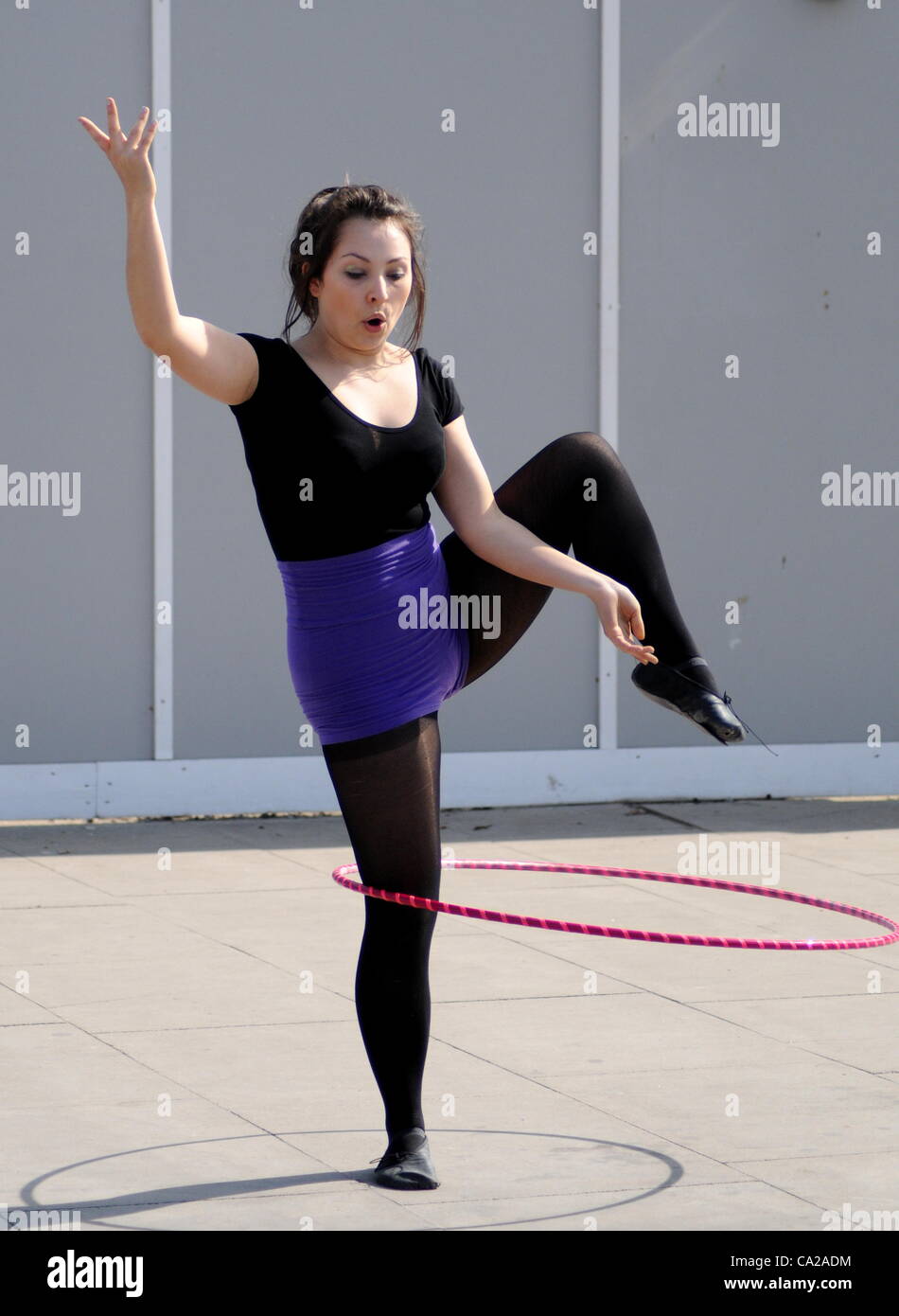 London, UK. 24/03/12. Hula-hoop performer, Polly MacFarlane, aka Miss ...