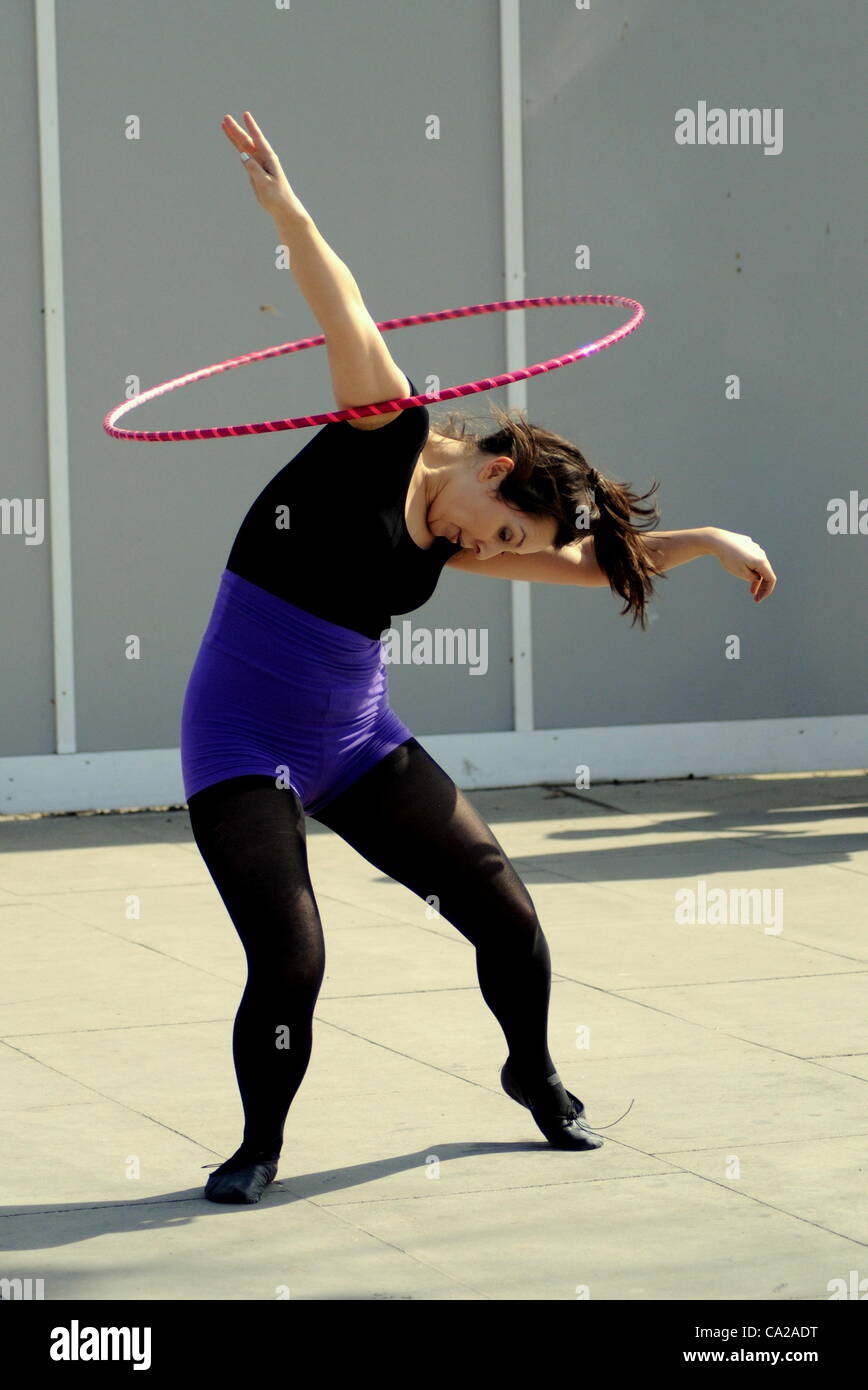London, UK. 24/03/12. Hula-hoop performer, Polly MacFarlane, aka Miss ...