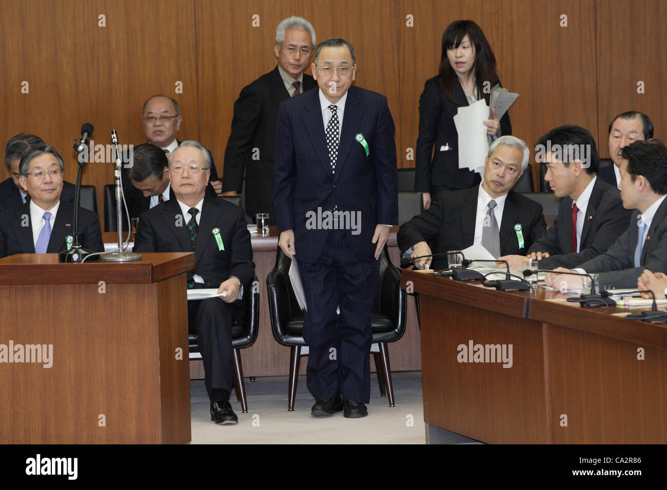 March 27, 2012, Tokyo, Japan - Kazuhiko Asakawa, center, president of ...