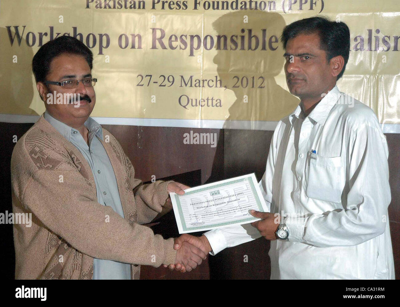 Certificates distribution ceremony hi-res stock photography and images ...