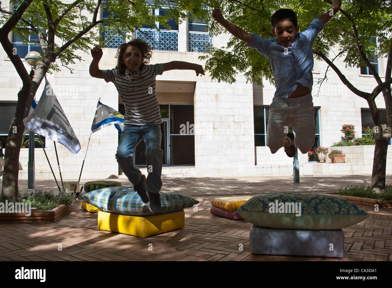 Two young boys play at an inauguration ceremony for an art installation ...