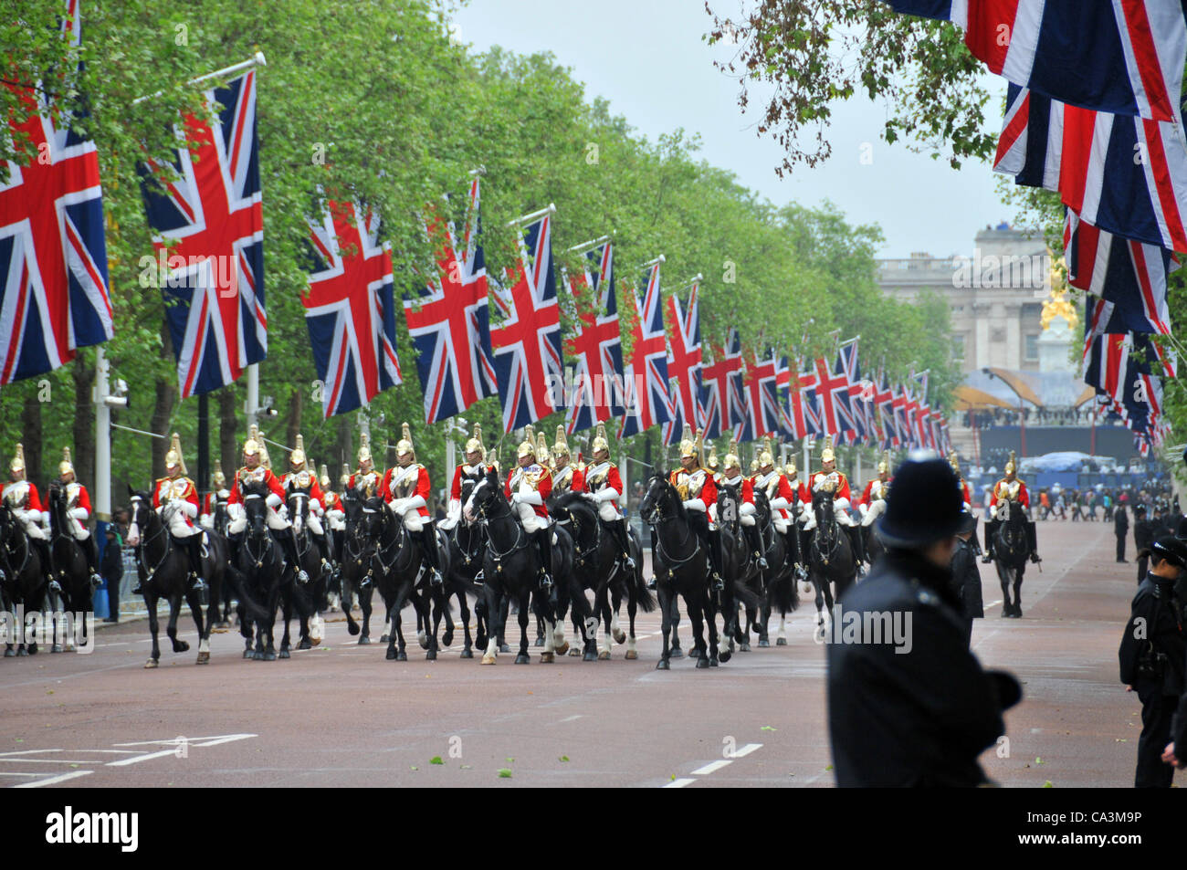 London, UK. 2nd June 2012. Life Guards ride down The Mall, with ...