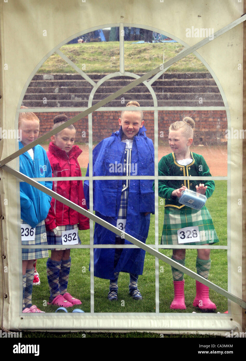 Shotts Highland Games. Shotts Scotland UK 2/05/12. Young girls wait ...