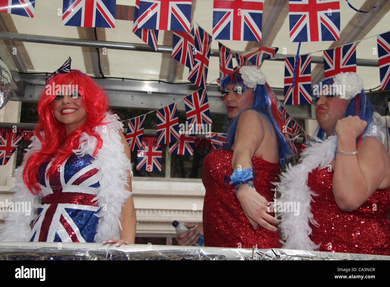 Men dressed as women in Union Jack's colours at Birmingham Pride in ...