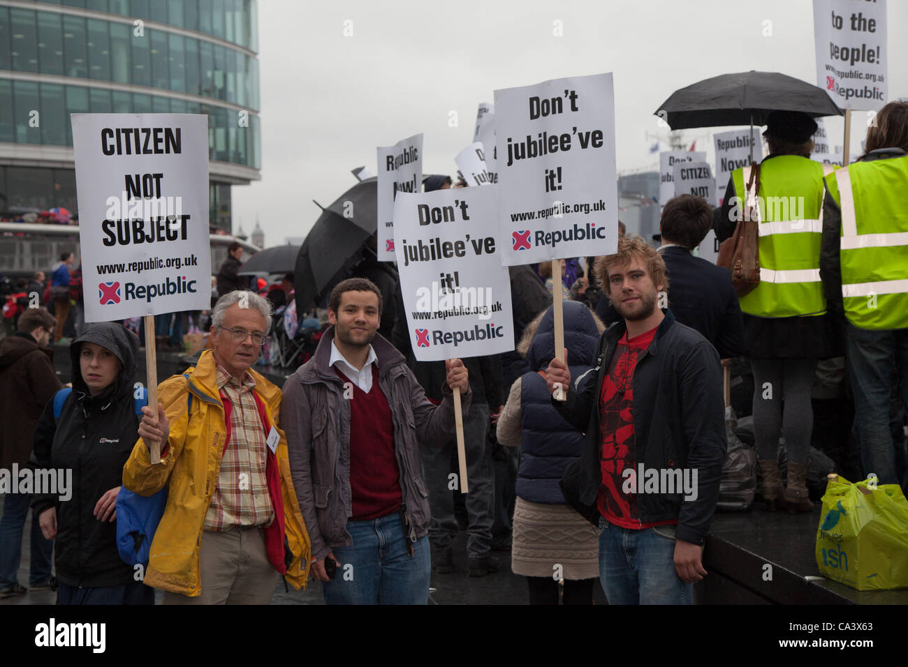 London, UK. 3rd June 2012 Members of the republic group hold up signs ...